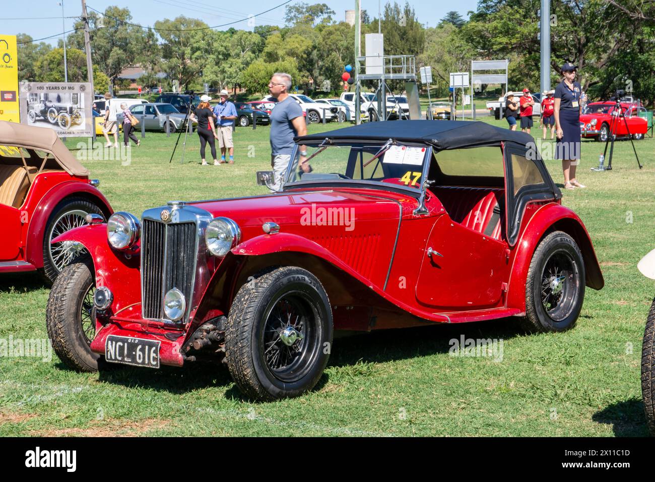 A red MG T type sports car on display at the 2024 Centenary National ...