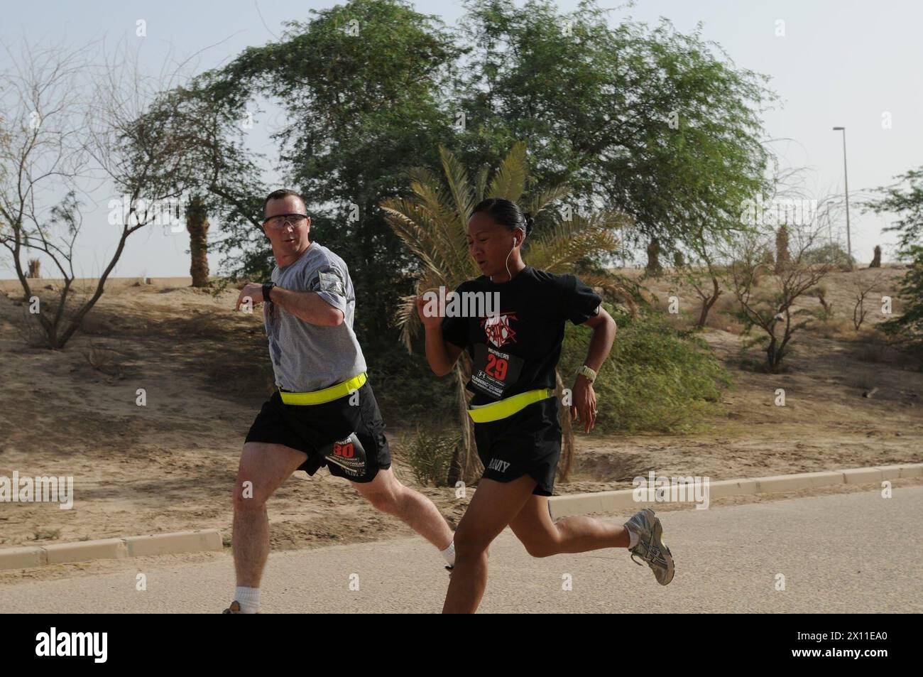Two Soldiers push through to the finish line during the Asian-Pacific ...