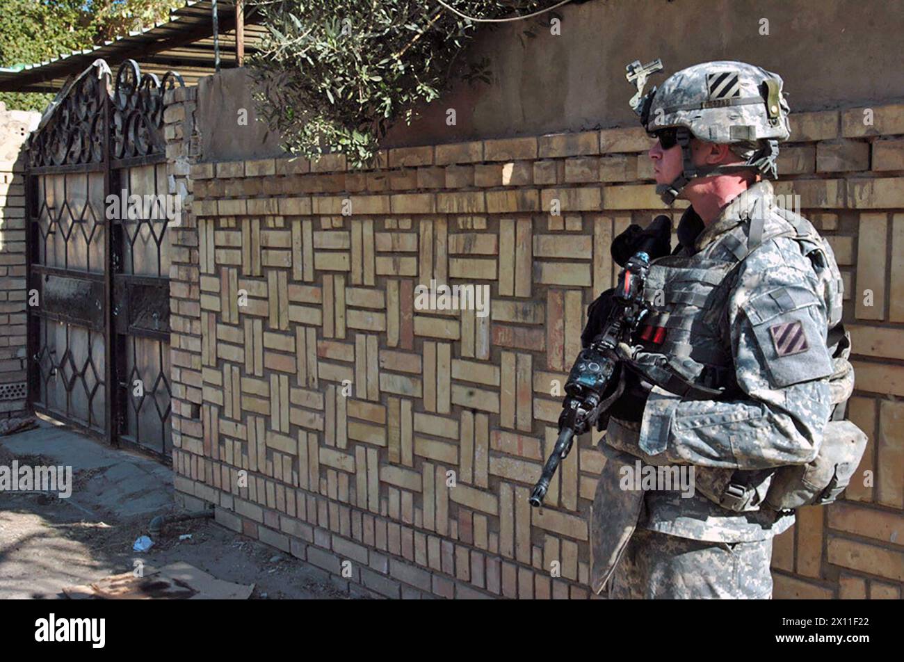 An army specialist with Company A, 1st Battalion, 64th Armor Regiment ...