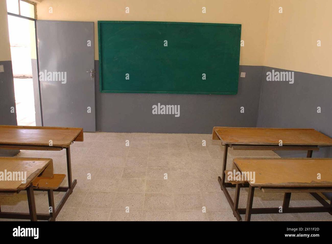 An empty classroom awaits the arrival of school children from the Ash ...