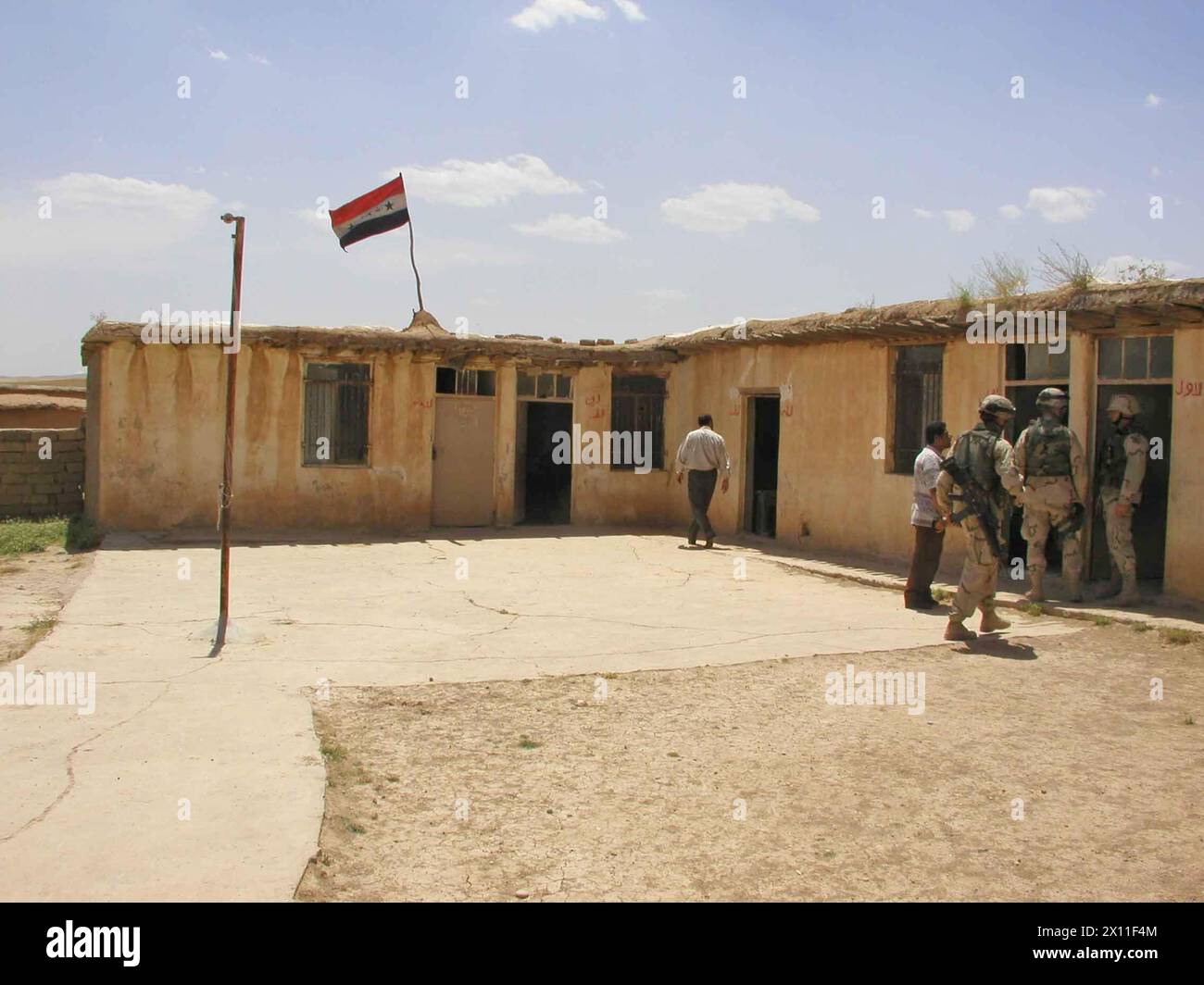 Soldiers from the 115th Signal Battalion inspect the Ash Shahiyah Iraq ...