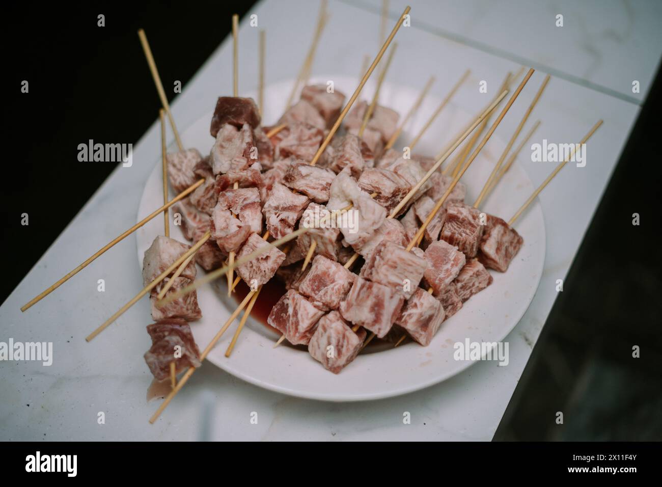 Saikoro who is ready is given a skewer and ready to be grilled Stock ...