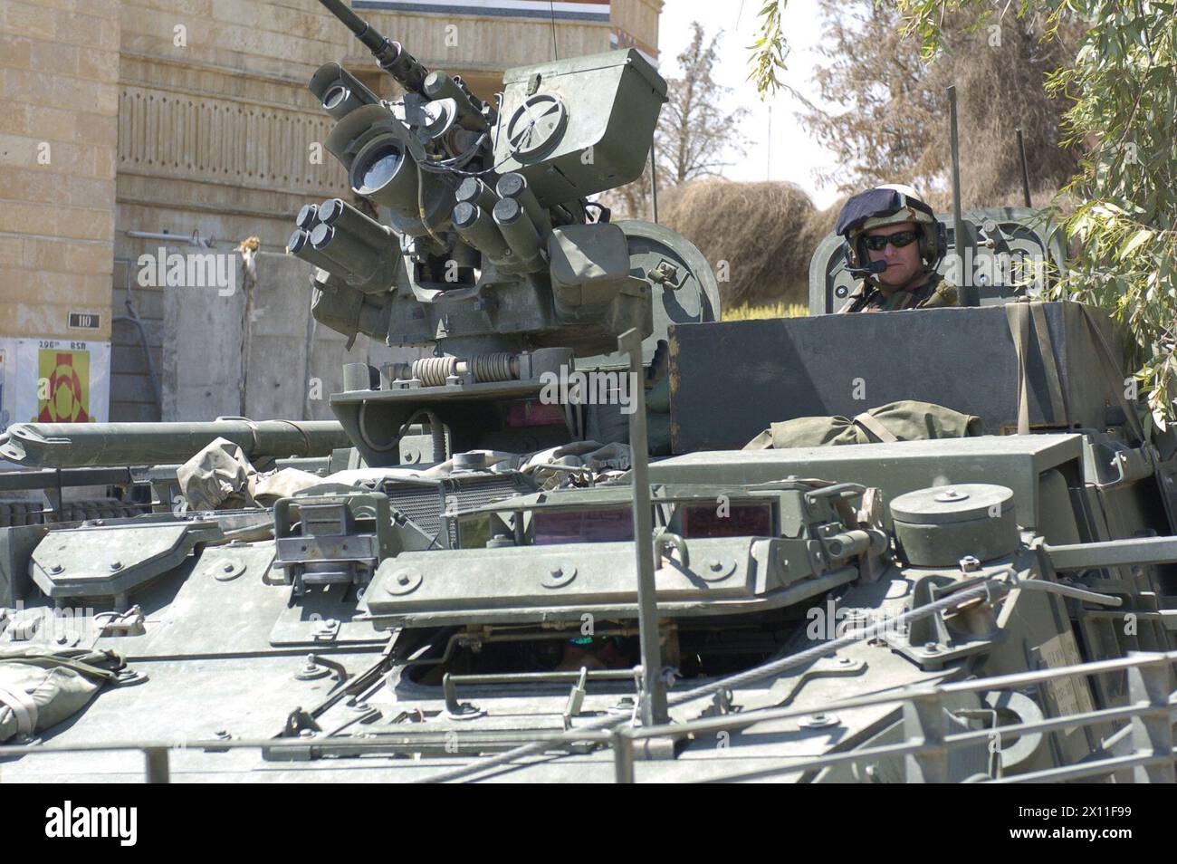 Sgt. Maj. of the Army Kenneth Preston peers out of the commanders seat ...