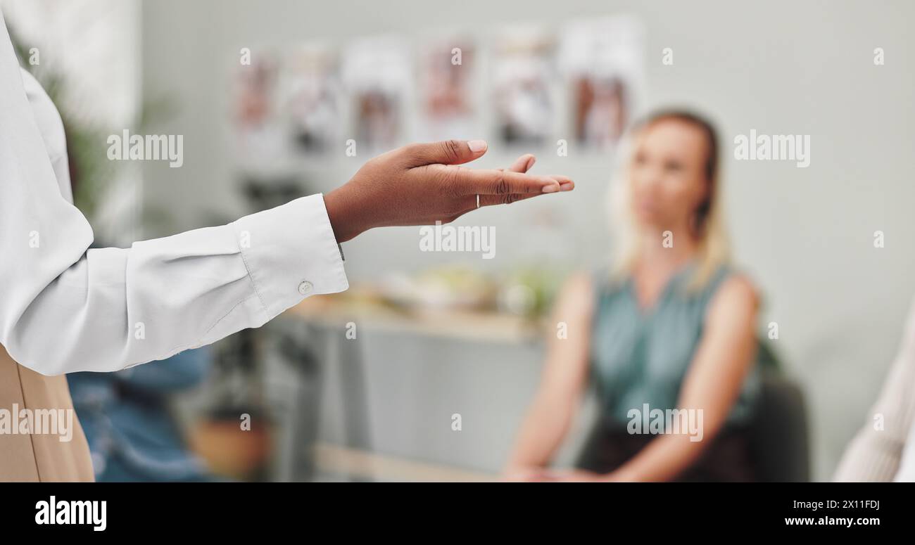 Hand, psychologist and session with group therapy in closeup for advice ...