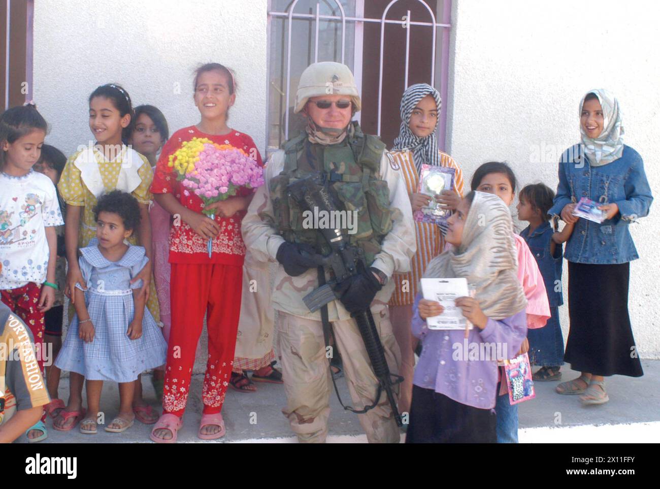 Soldier stands with school children hi-res stock photography and images ...