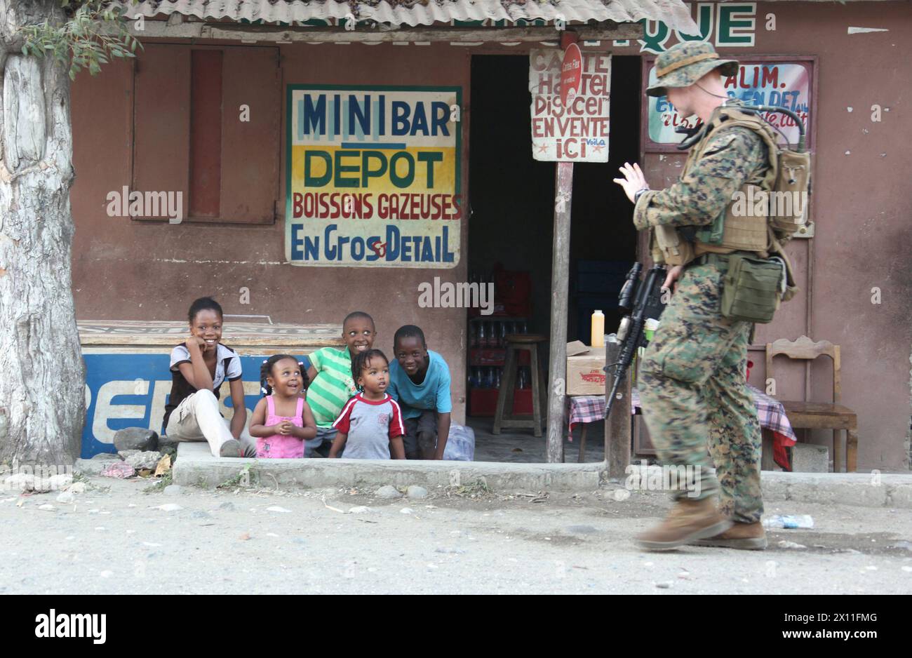 A Marine from Lima Company, Battalion Landing Team, 3rd Battalion, 2nd ...