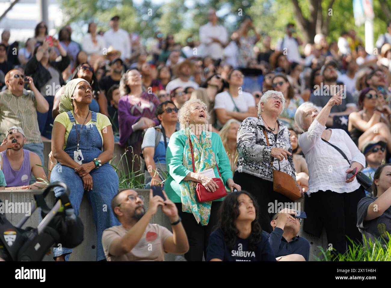 Dallas, United States. 13th Apr, 2024. Dallas, Texas, USA: People watch ...