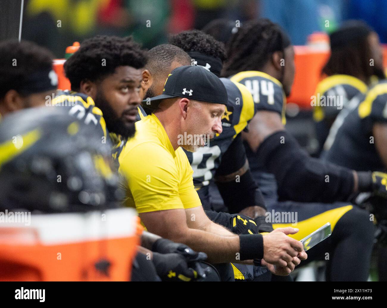 San Antonio, Texas, USA. 14th Apr, 2024. SA Brahmas defensive line coach Chris Achuff looking at ...