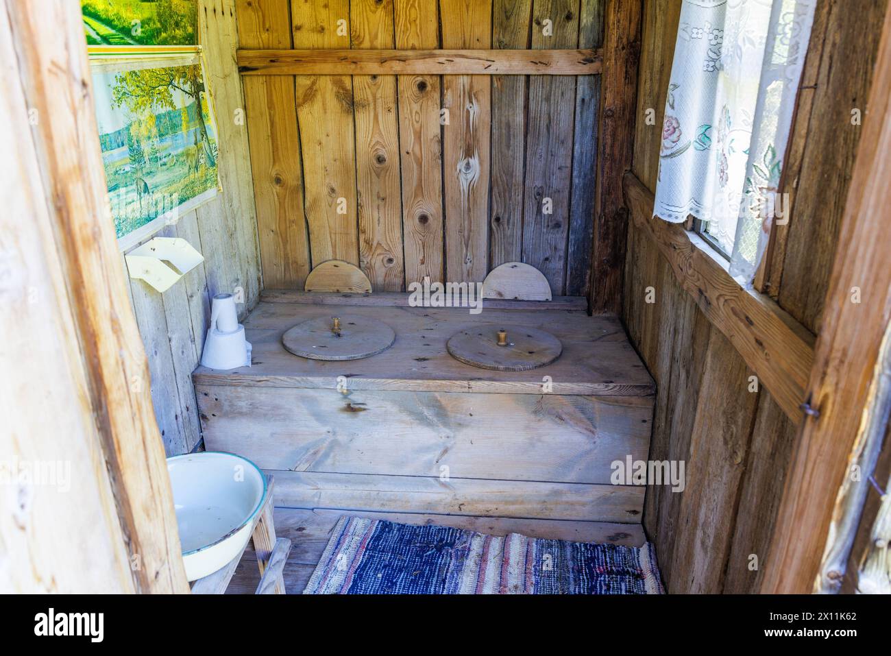 Double outhouse hi-res stock photography and images - Alamy