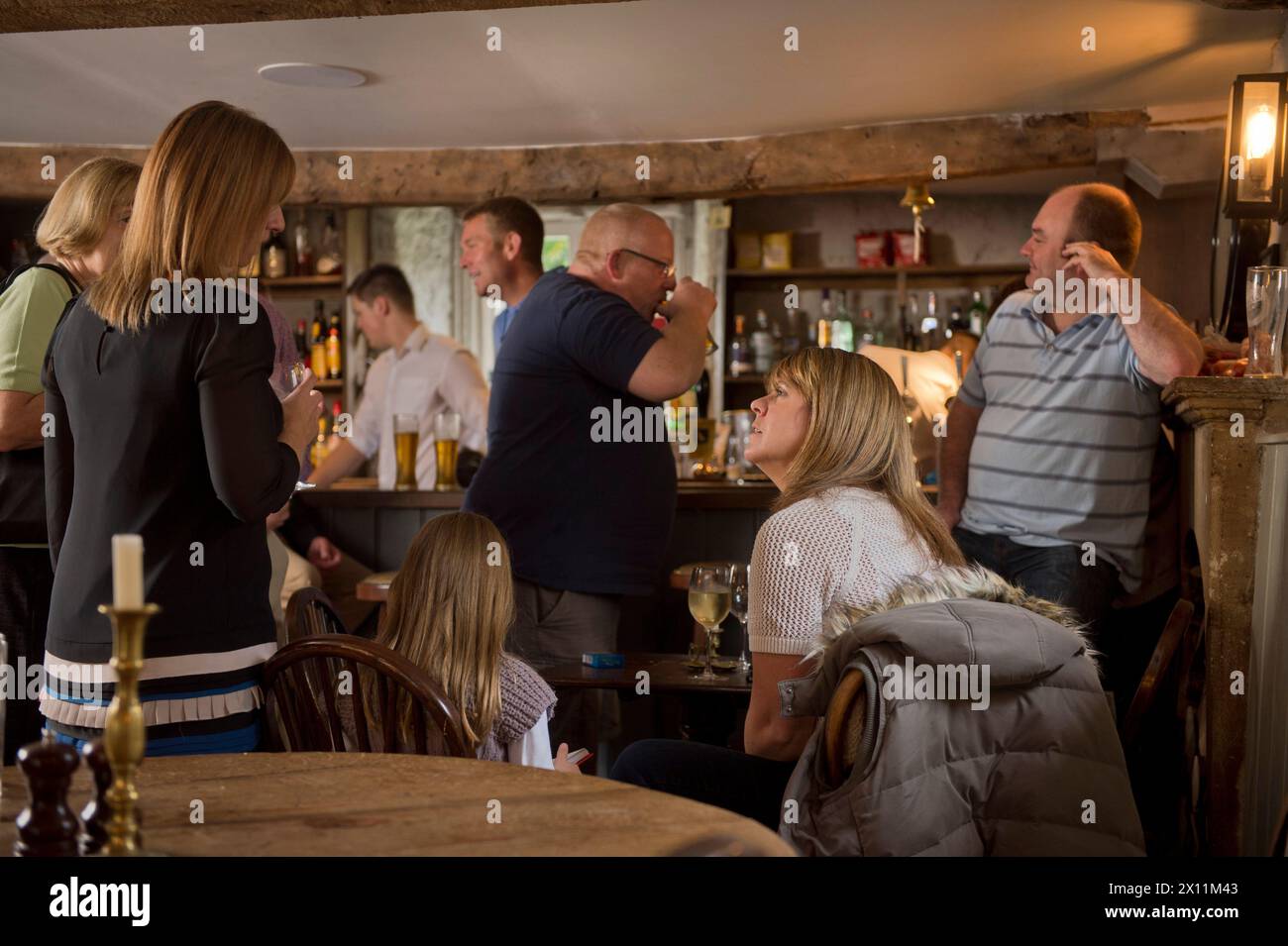 Sunday lunchtime drinks at the Talbot Inn in Mells, Somerset UK Stock ...