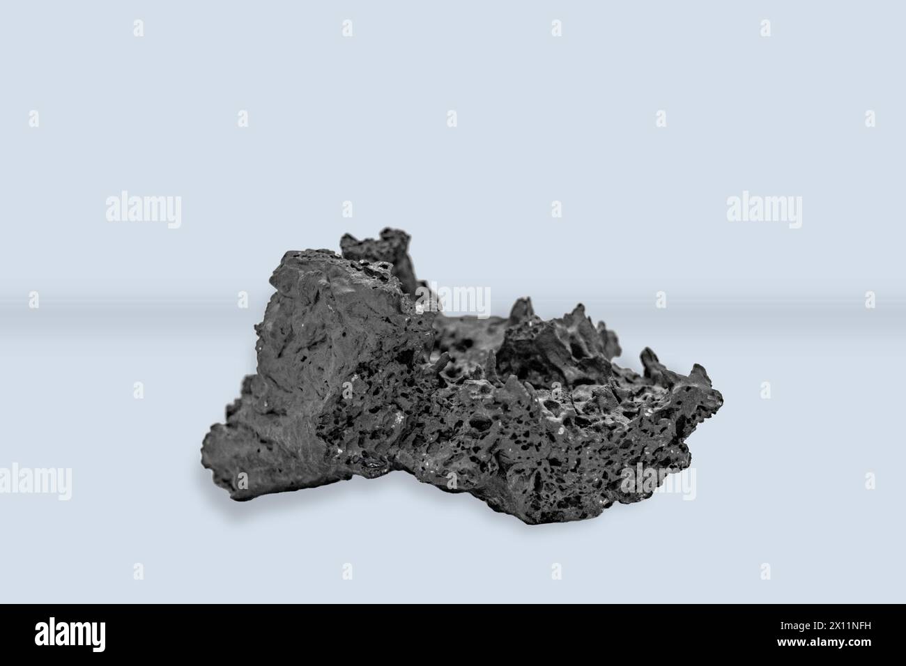 A volcanic ash rock decorative podium in black 3D Stock Photo - Alamy