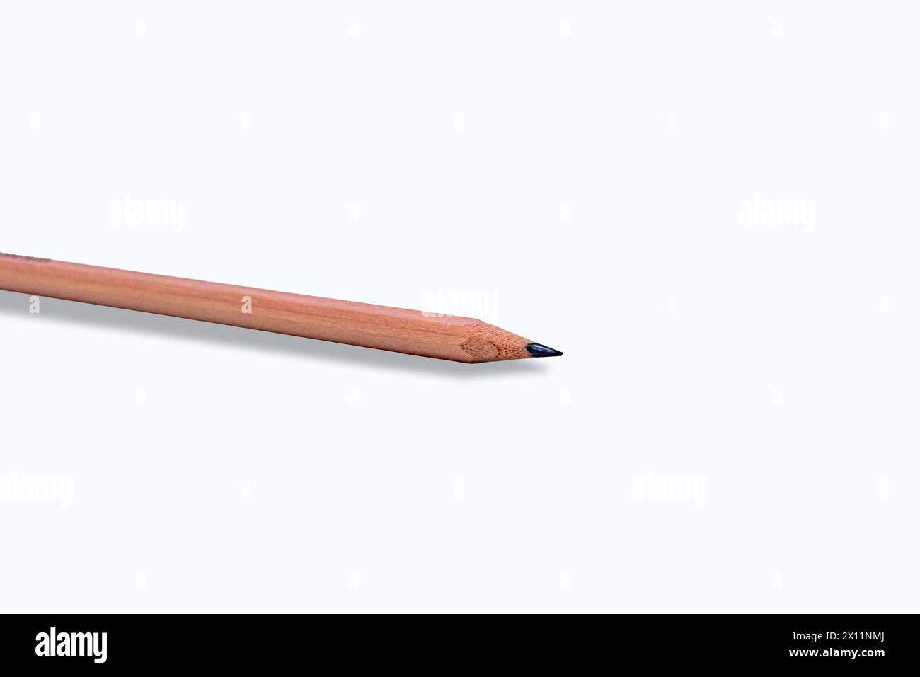 a wooden pencil with a black sharp tip is shown in a white background ...