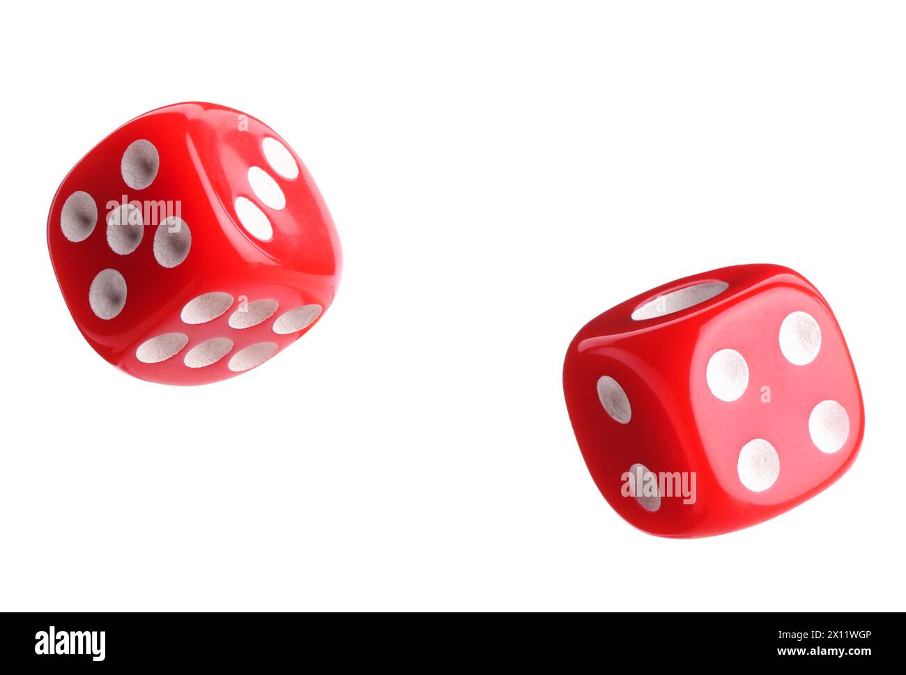 Two red dice in air on white background Stock Photo - Alamy