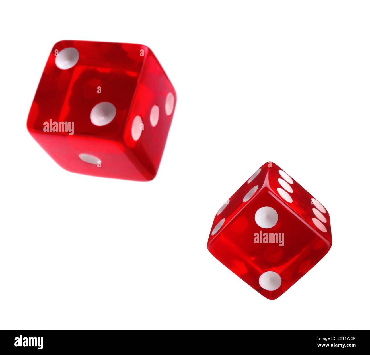 Two red dice in air on white background Stock Photo - Alamy