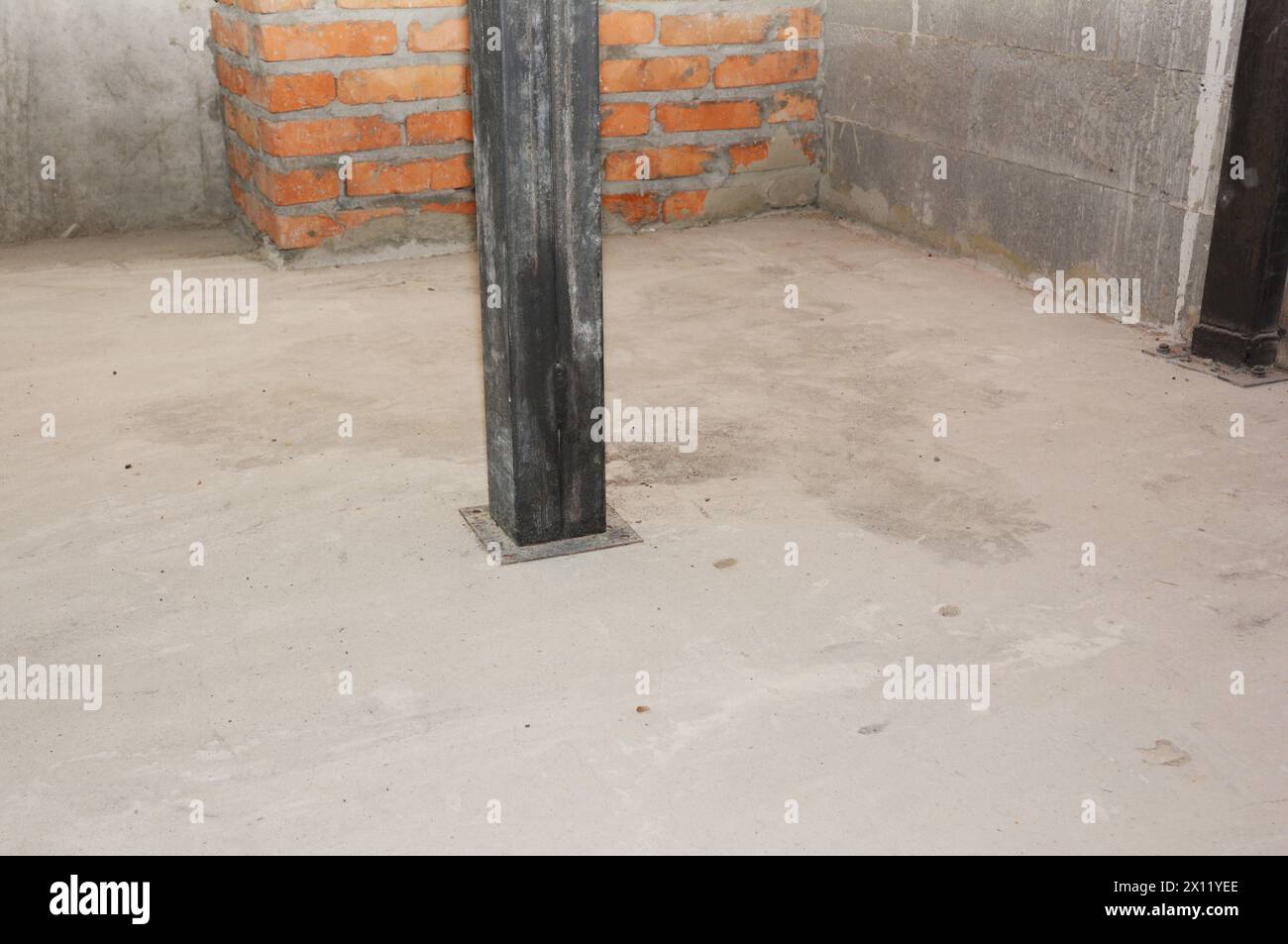 Metal pillar inside new house construction. Metal pillar construction ...