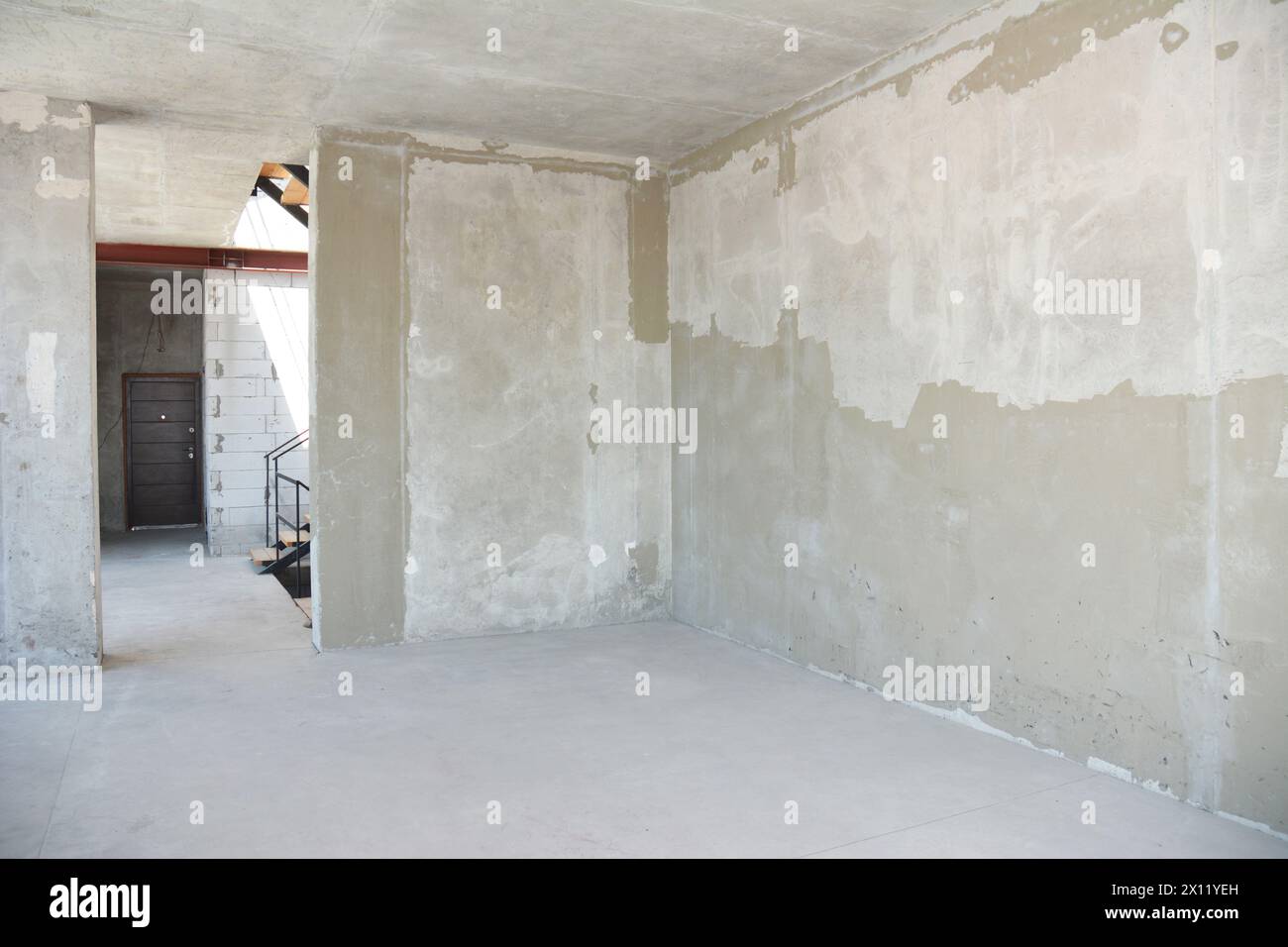 House room under construction with stucco, plastering walls Stock Photo ...