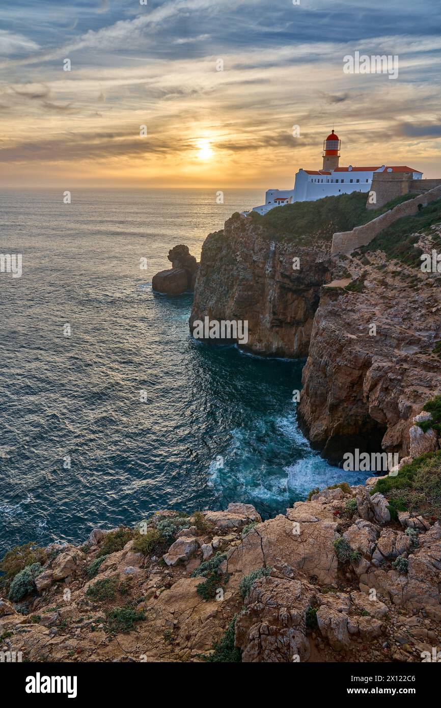 moody view on Cabo Sao Vicente with its famous lighthouse at sunset at ...