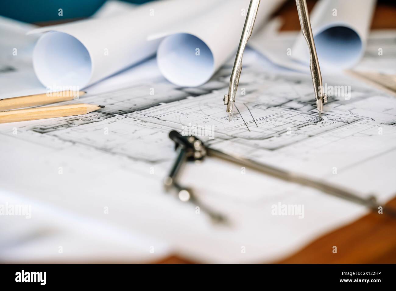 Architectural engineering design plan drawing on the table. Architect's ...