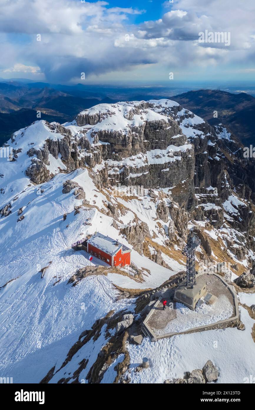 Aerial view of the top of Monte Resegone and Rifugio Azzoni in winter ...