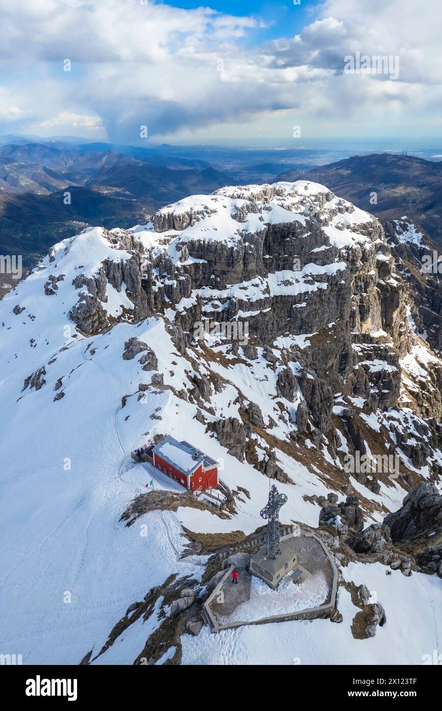 Aerial view of the top of Monte Resegone and Rifugio Azzoni in winter ...