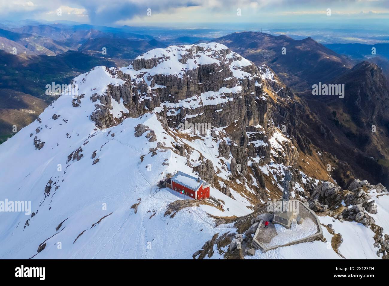 Aerial view of the top of Monte Resegone and Rifugio Azzoni in winter ...
