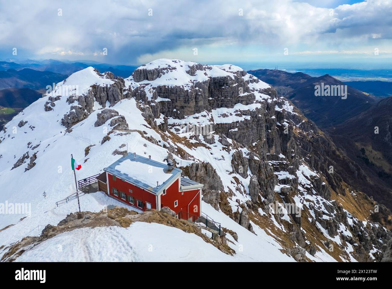 Aerial view of the top of Monte Resegone and Rifugio Azzoni in winter ...