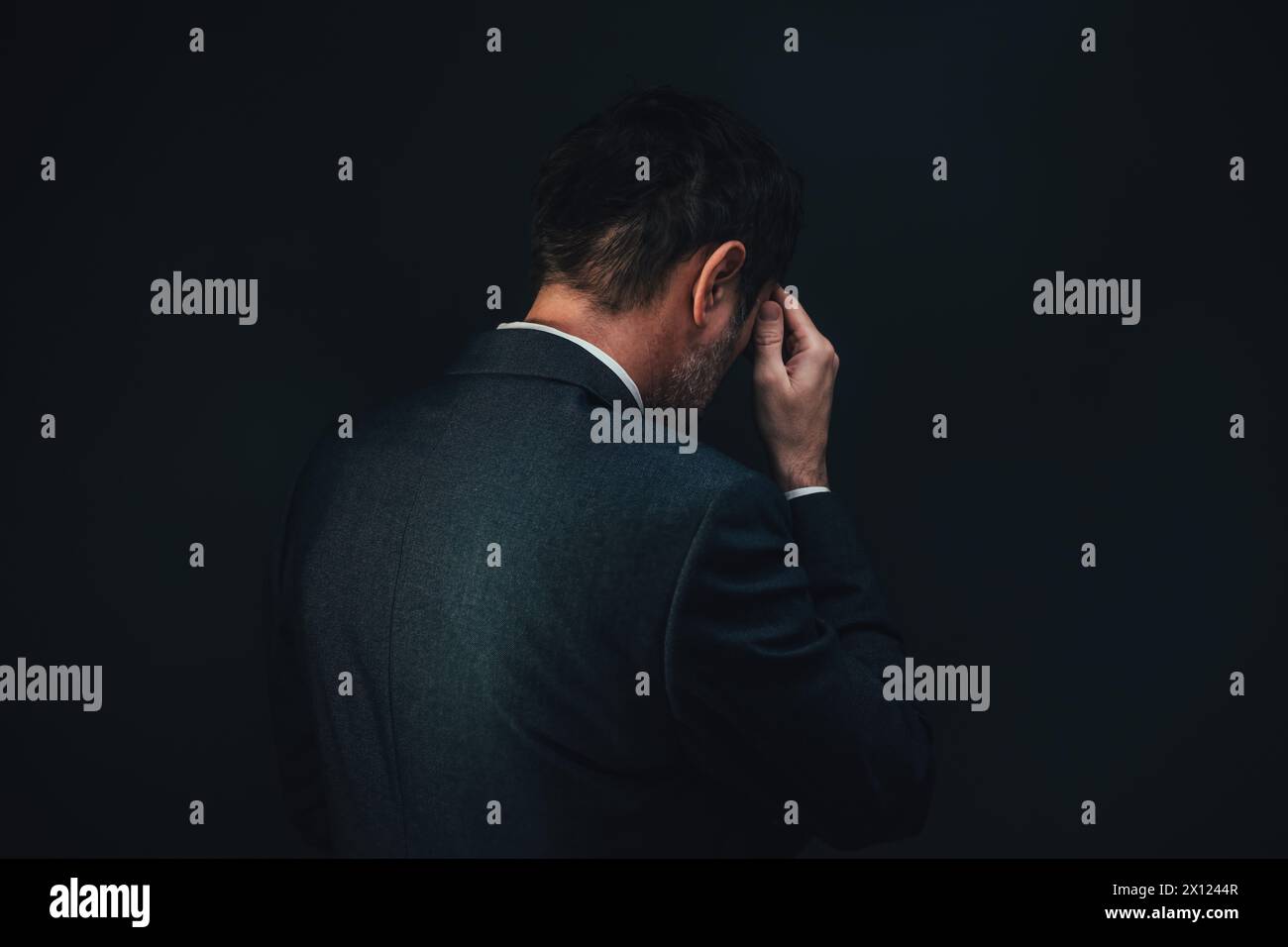 Rear view of sad depressed businessman from behind Stock Photo - Alamy