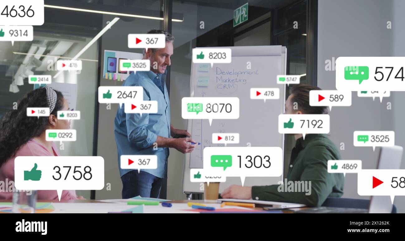Image of notification bars over diverse manager explaining strategy to ...