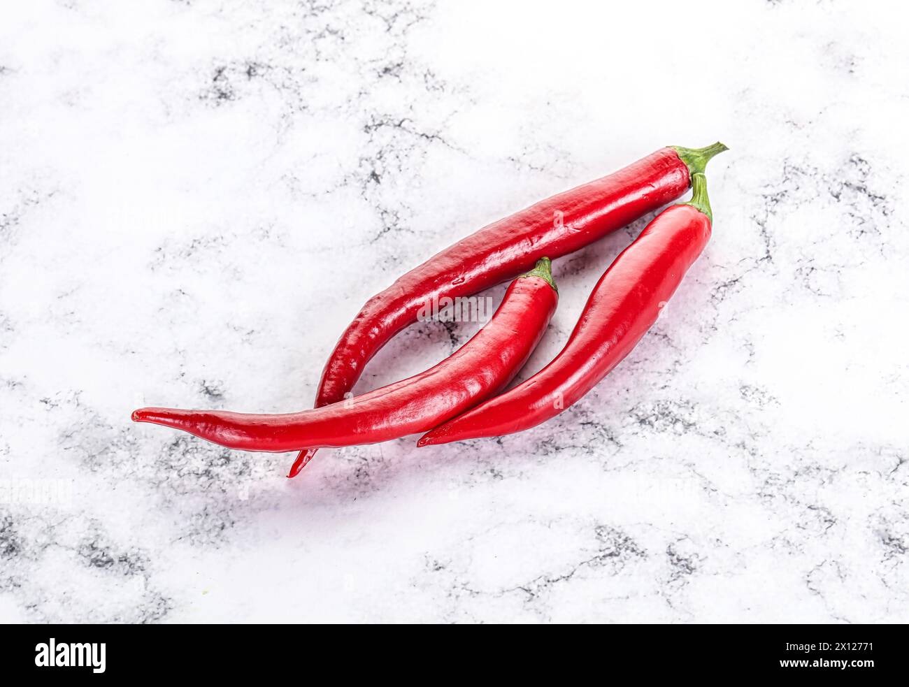 Hot and spicy chili pepper heap Stock Photo - Alamy