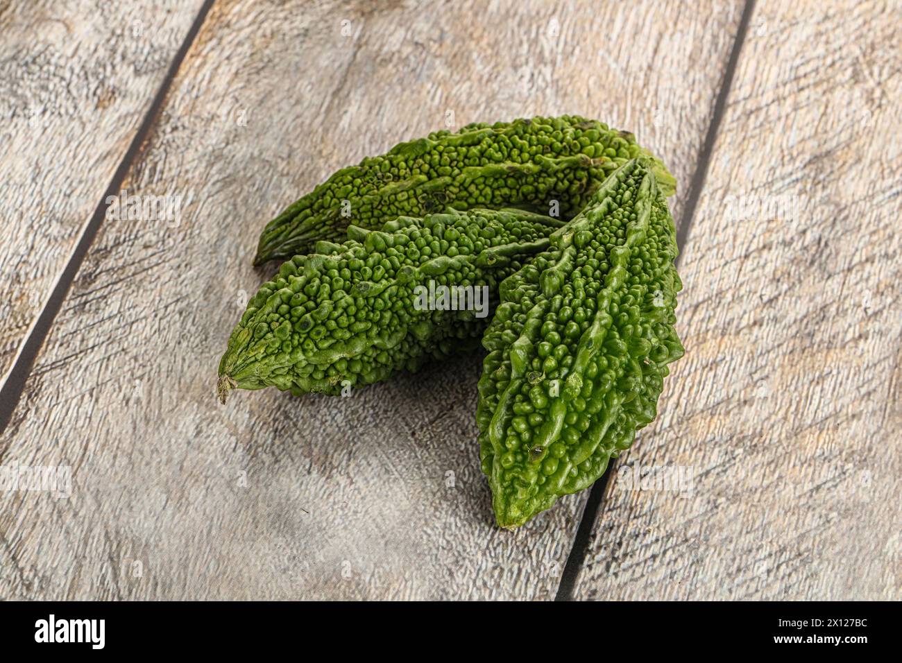 Green raw bitter lemon vegetables heap Stock Photo - Alamy
