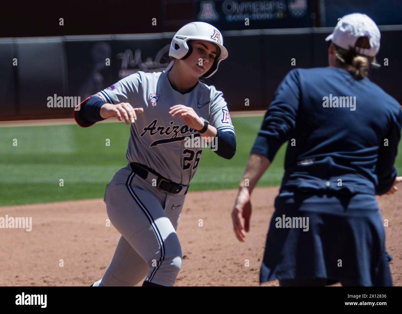April 14, 2024 Tucson, AZ U.S.A. Arizona catcher Olivia DiNardo (26) rounds the bases after ...