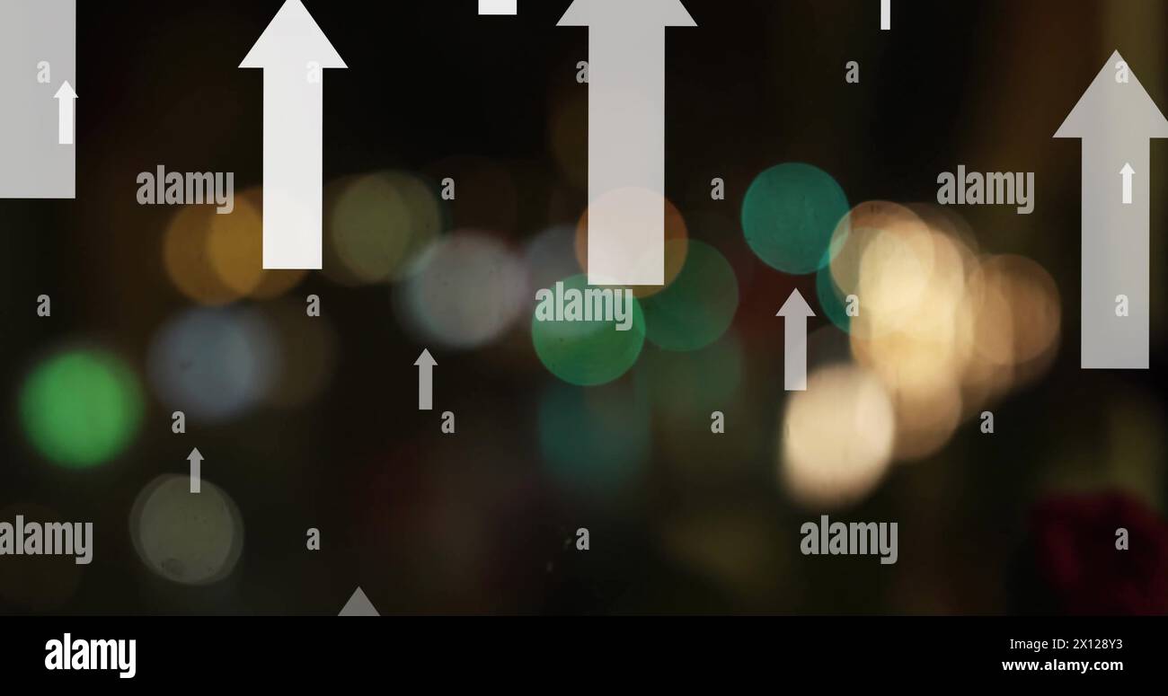 Image of multiple up arrows over blurred vehicles moving on street in ...