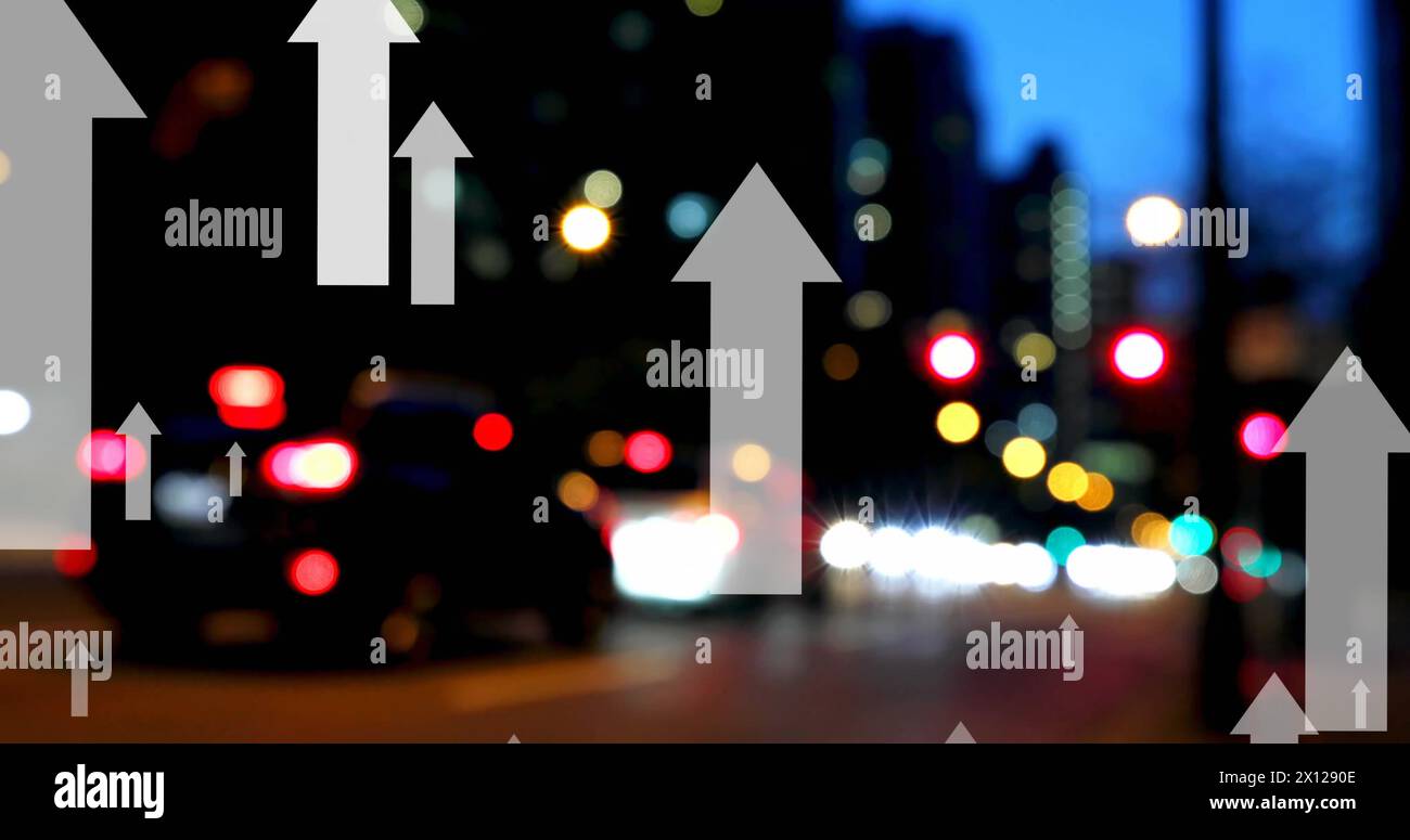 Image of multiple up arrows over blurred vehicles moving on street in ...
