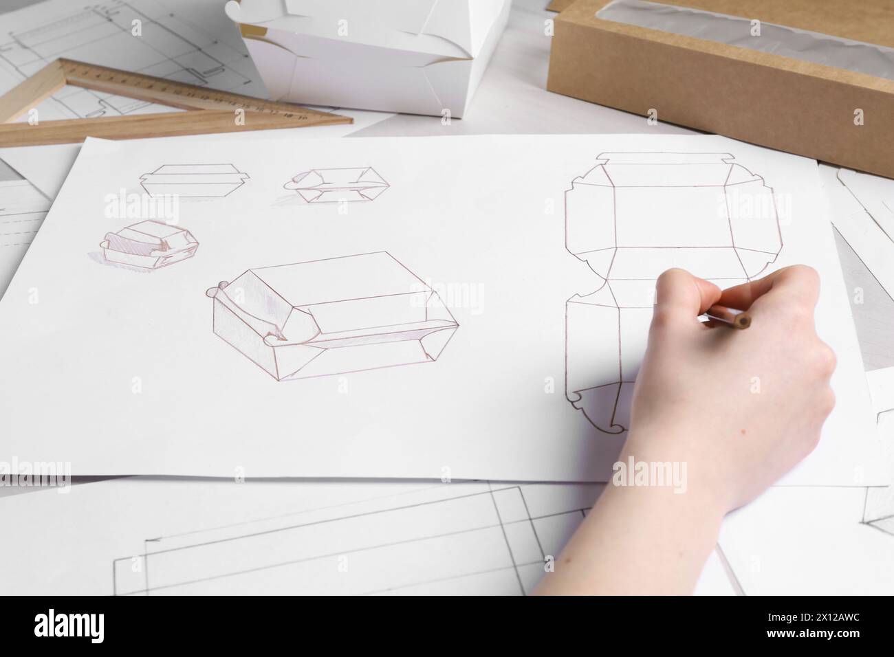 Woman creating packaging design hi-res stock photography and images - Alamy
