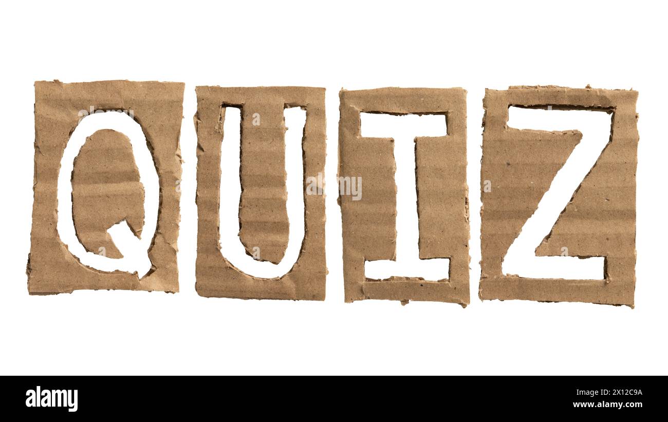 A word "QUIZ" crafted from a cardboard on white background with ...