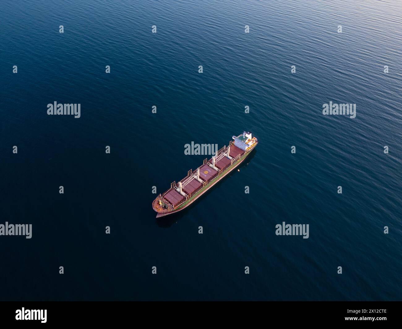 Large bulk carrier cargo ship Floating on Vast Water Stock Photo - Alamy