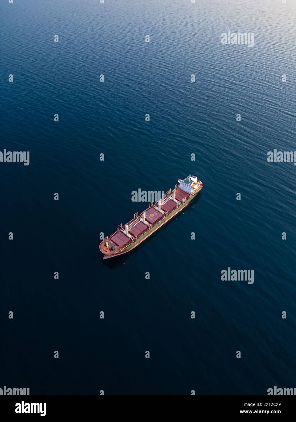 Large bulk carrier cargo ship Floating on Vast Water Stock Photo - Alamy