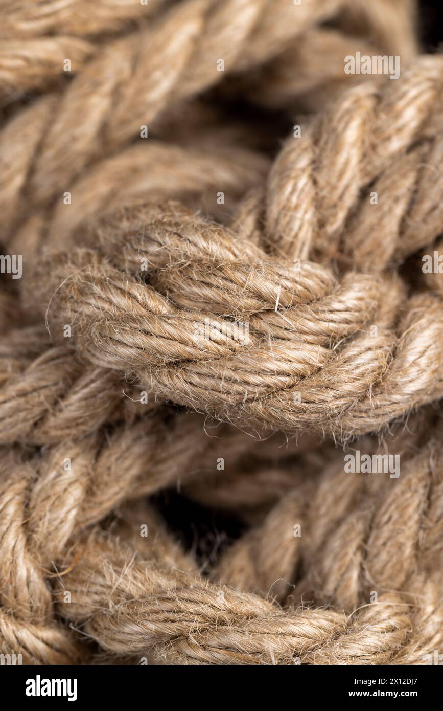 coarse linen rope in close-up, a rope from which you can tie a knot ...