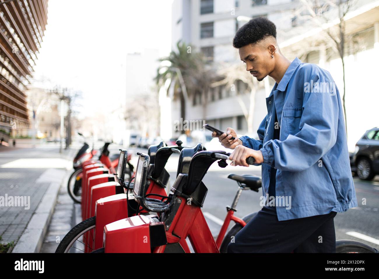 African american man bike using hi-res stock photography and images - Alamy