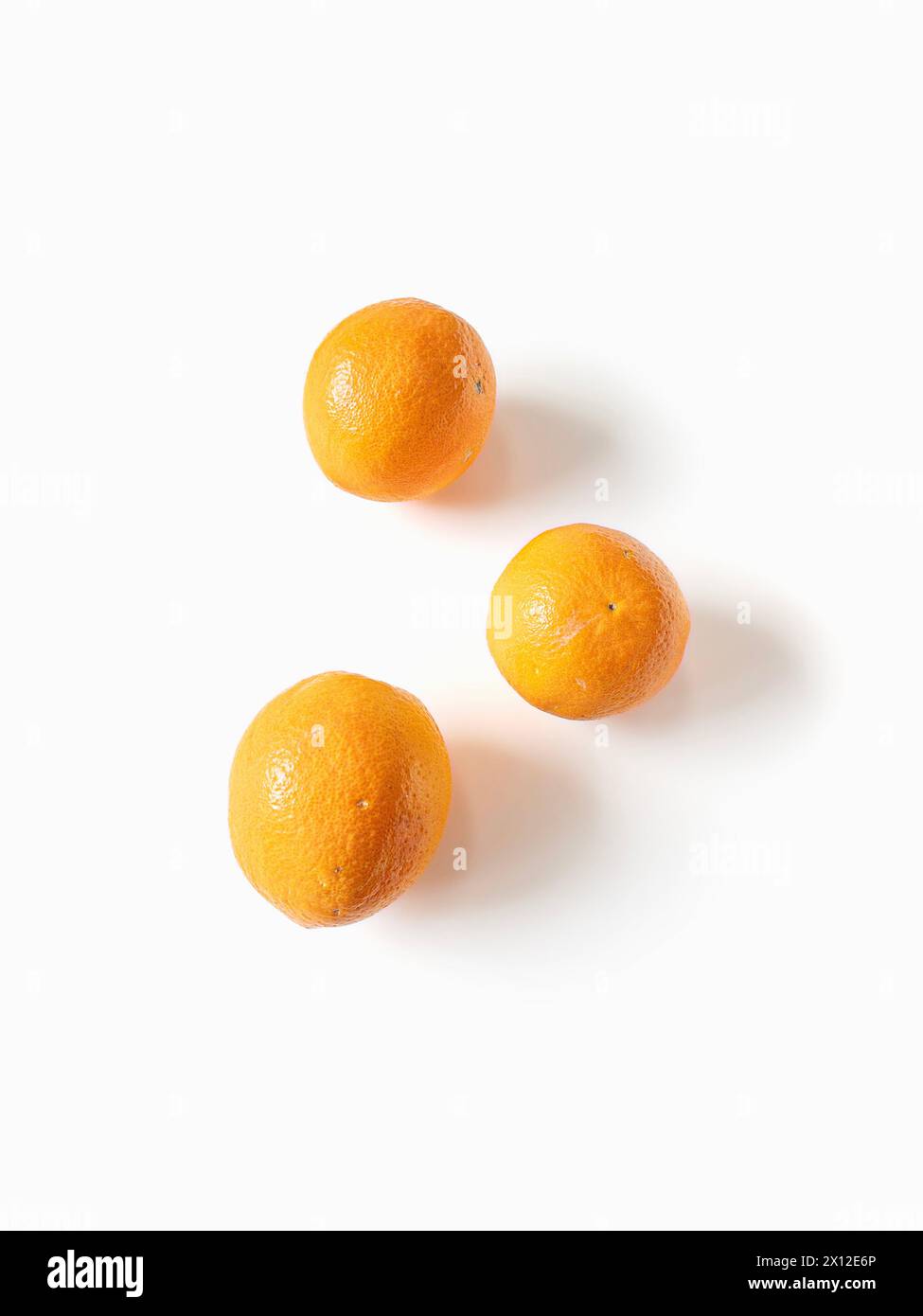Fresh unpeeled oranges top view isolated on white background Stock ...