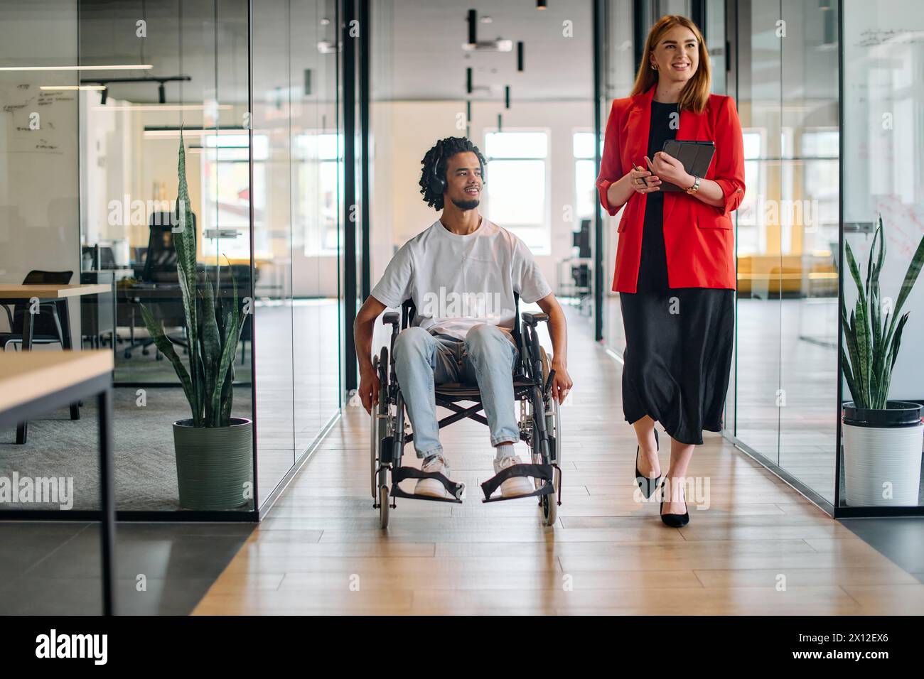 A business leader with her colleague, an African-American businessman ...