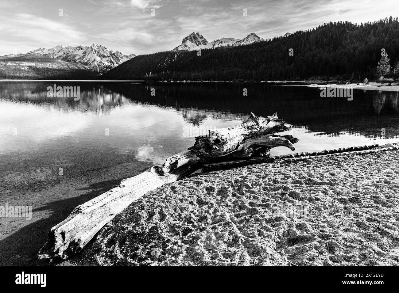 Sawtooth Mountains and alpine lake with sandy beach Stock Photo - Alamy