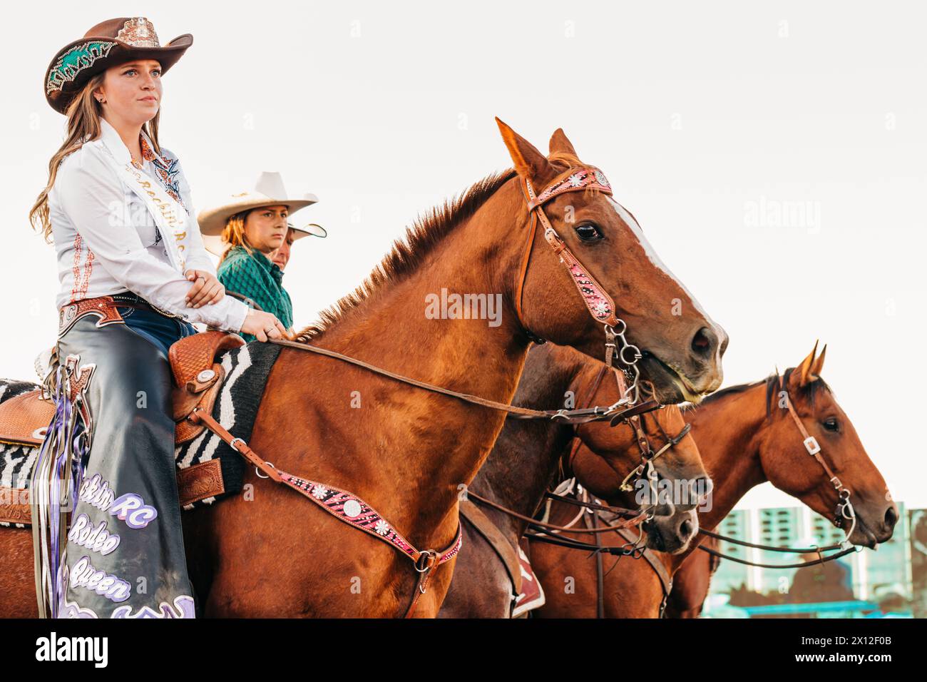 Cowgirl sitting on horse hi-res stock photography and images - Alamy