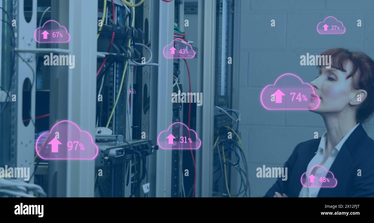 Image of clouds icons over caucasian female worker inspecting server ...