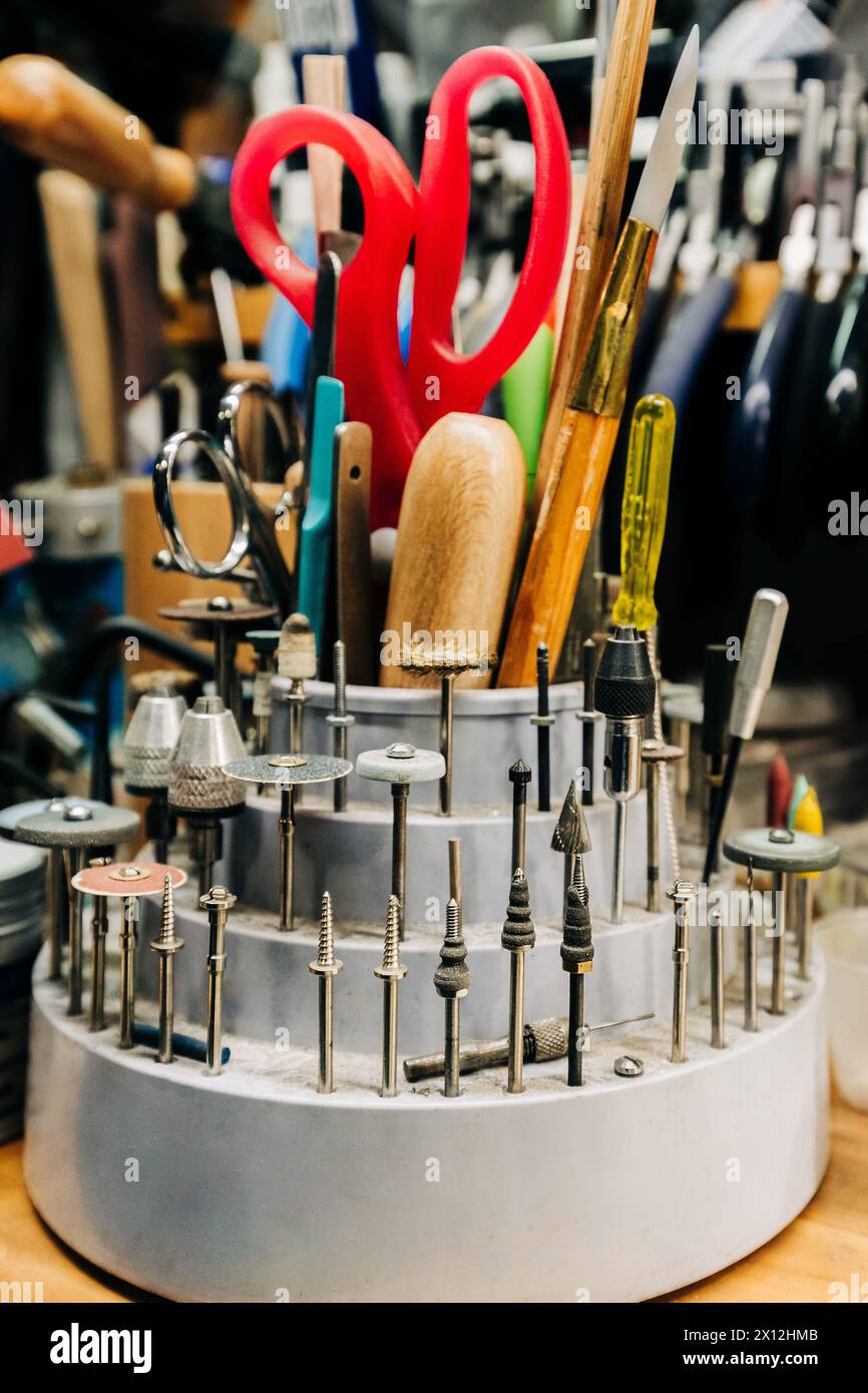 Jewelry making tool caddy atop jewelers bench Stock Photo - Alamy