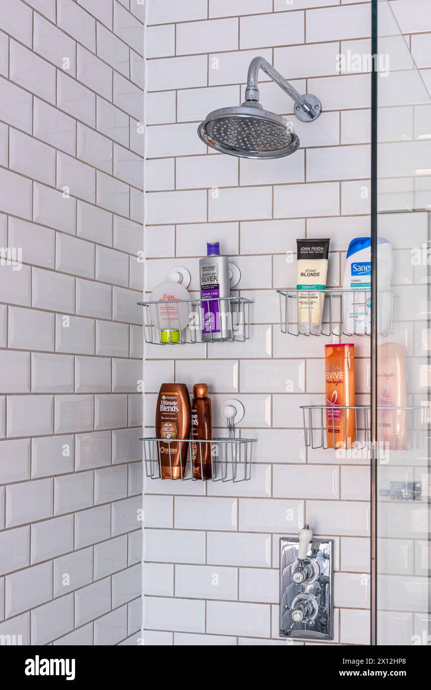 Shower storage in London flat, UK Stock Photo - Alamy