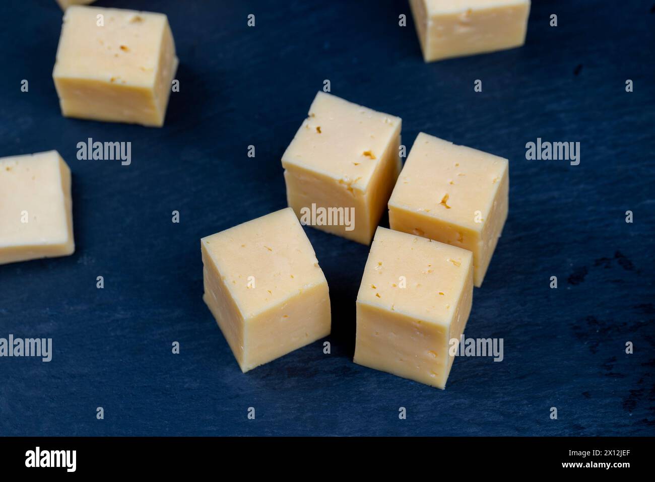 Cheese cubes pieces swiss hi-res stock photography and images - Alamy