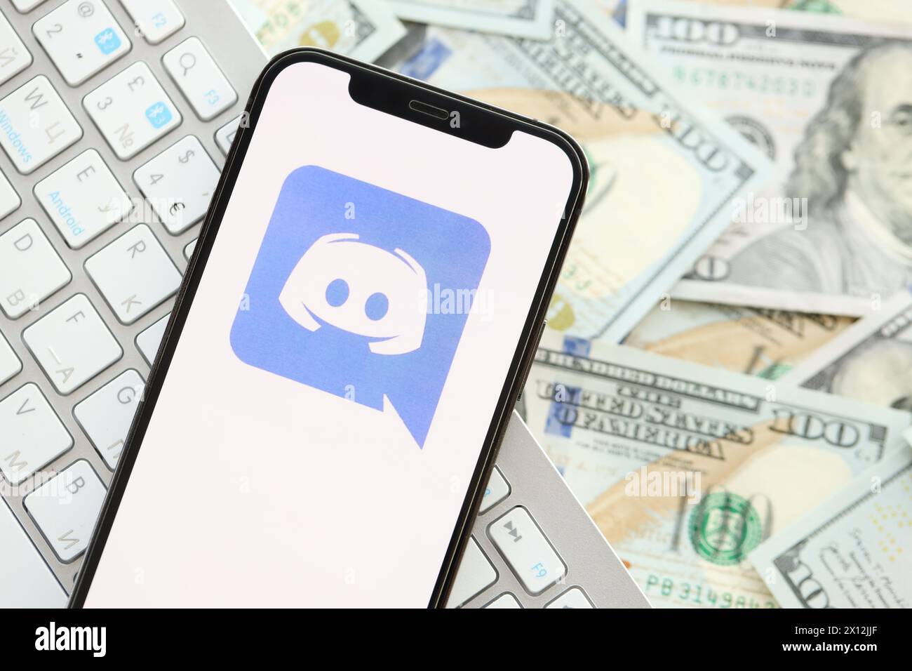 KYIV, UKRAINE - APRIL 1, 2024 Discord icon on smartphone screen on many ...