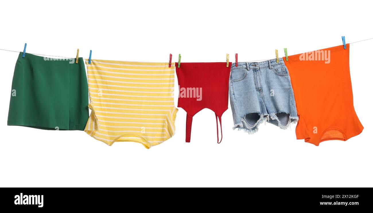 Different clothes drying on laundry line against white background Stock ...