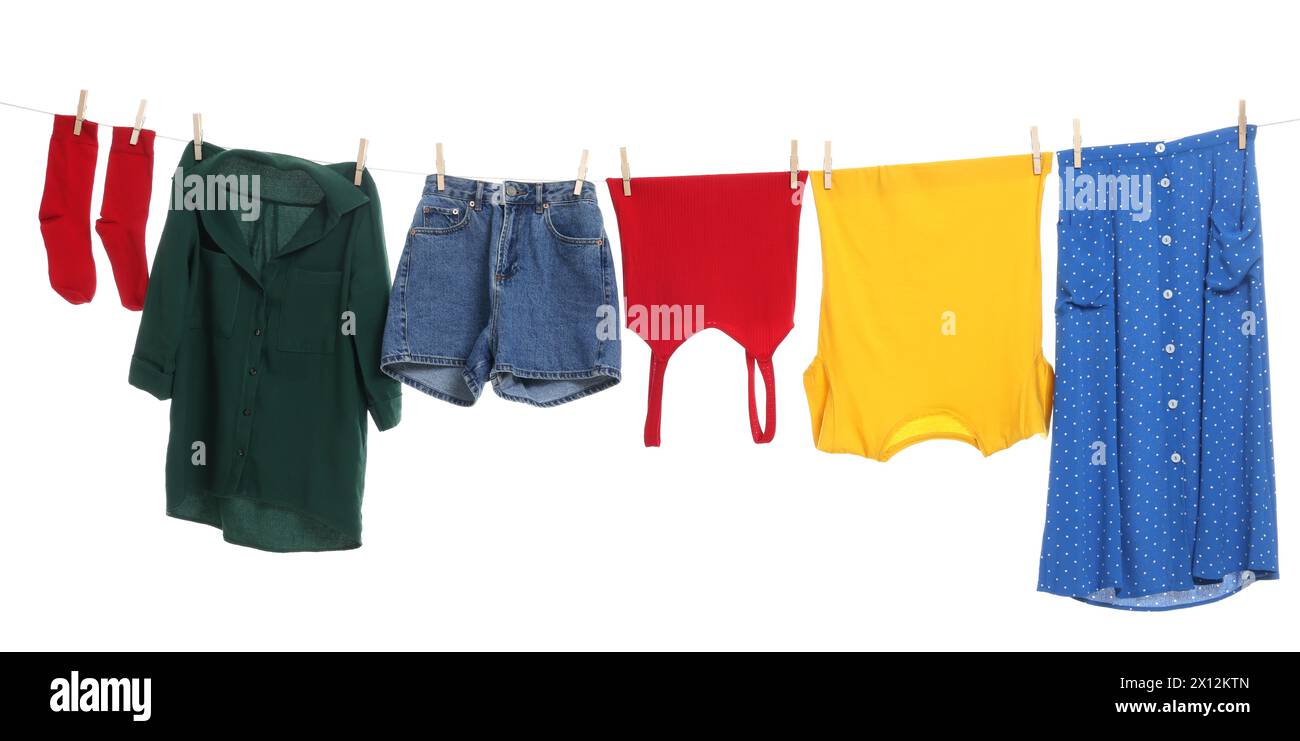 Different clothes drying on laundry line against white background Stock ...